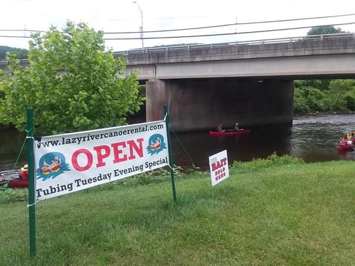 Lazy River Canoe Rental Sign & river | Visit PA Great Outdoors