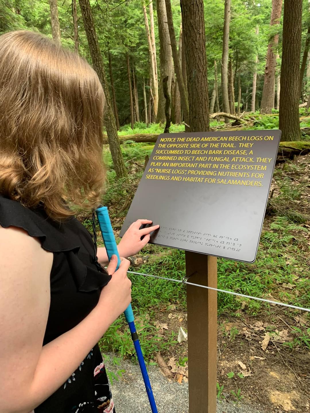 Mandy at sign | Visit PA Great Outdoors