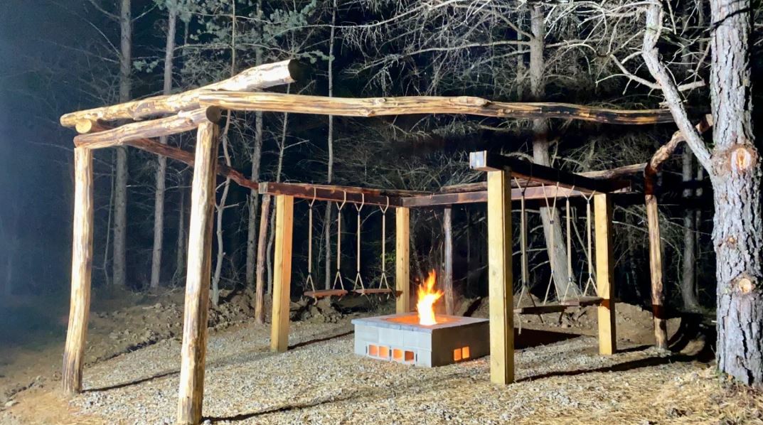 fire pit with swings forest villas estates | Visit PA Great Outdoors