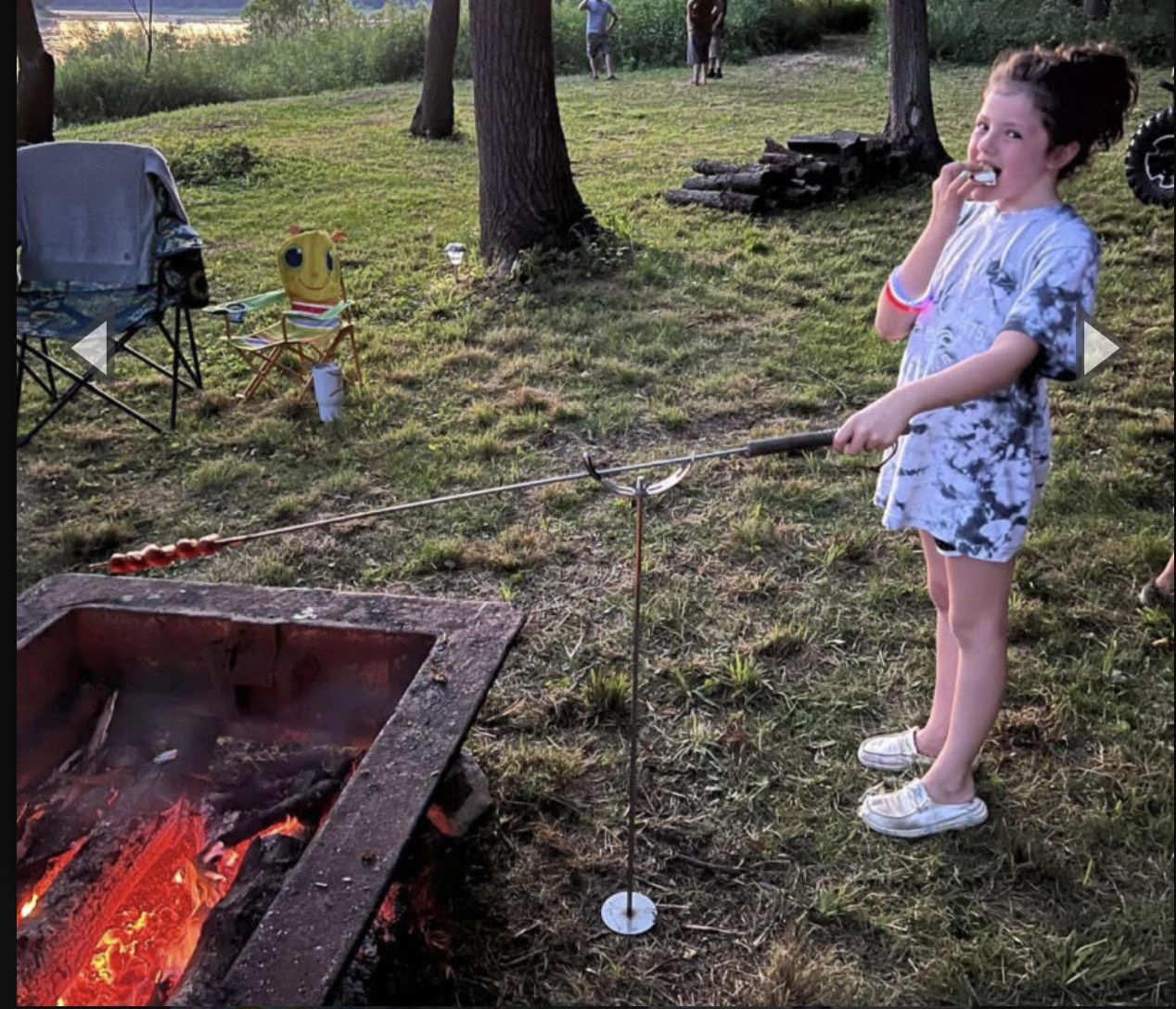 girl eating smore campfire creation | Visit PA Great Outdoors
